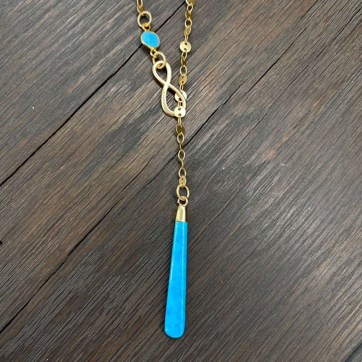 Infinity lariat with turquoise drop - brushed gold – Renee Piatt Collection